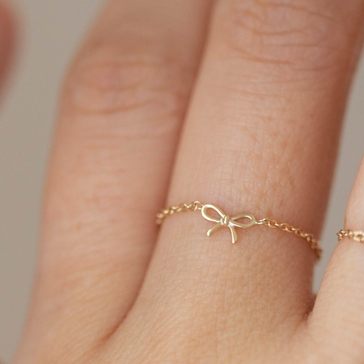 14k Bow chain ring – E&E PROJECT