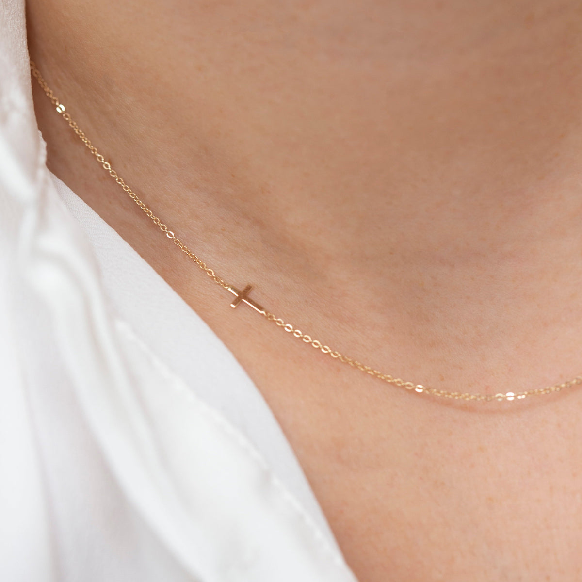 14k Gold Dainty Sideway Cross – E&E PROJECT